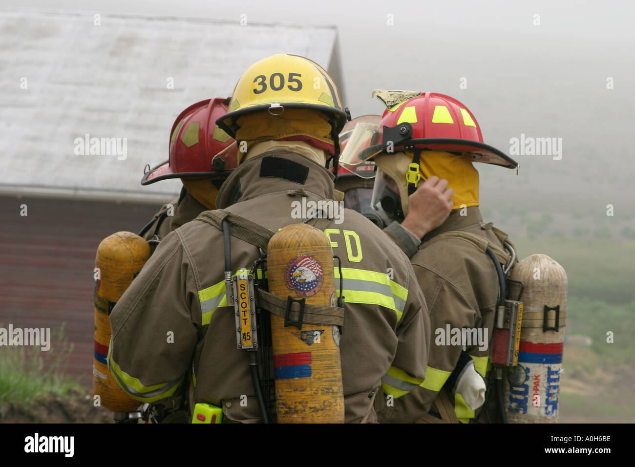 Firefighters Preparing to Enter Burning Structure Stock Photo - Alamy