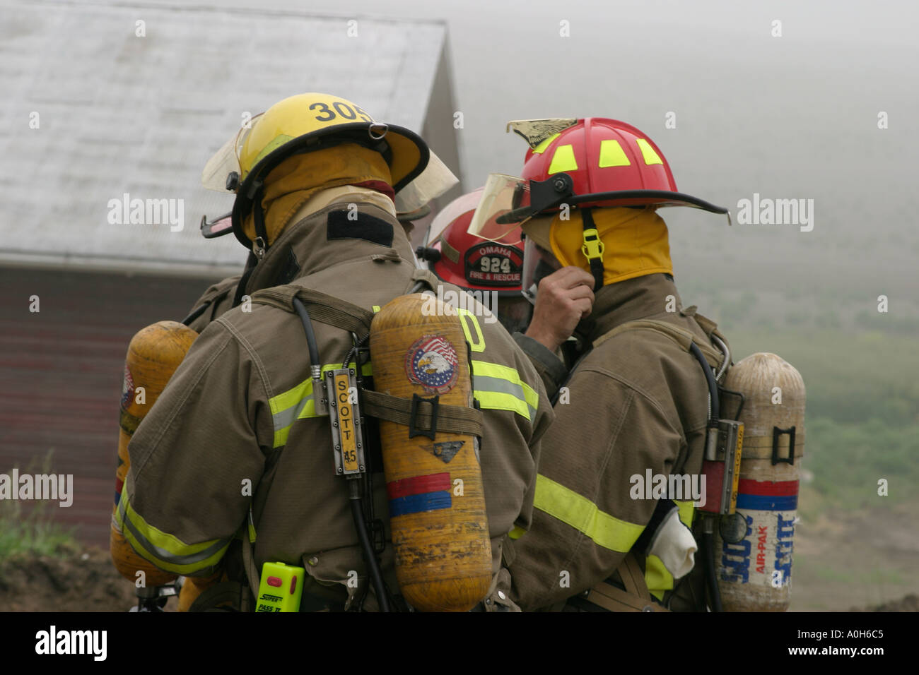 Firefighters Preparing to Enter Burning Structure Stock Photo - Alamy