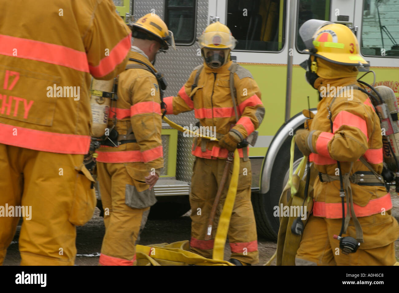Firefighters Preparing to Enter Burning Structure Stock Photo - Alamy