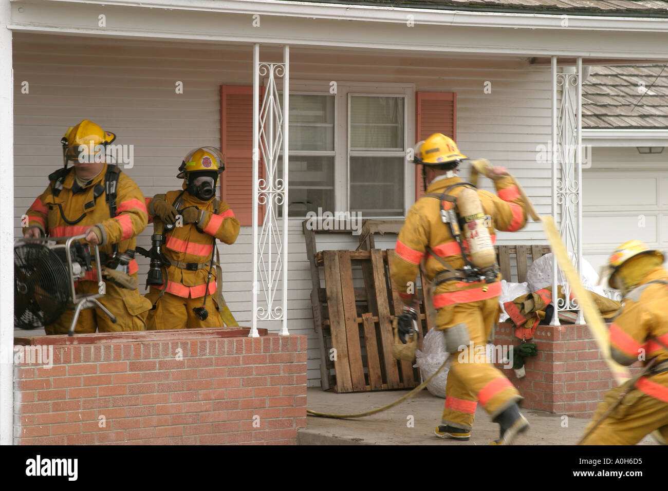 Firefighters Preparing to Enter Burning Structure Stock Photo - Alamy