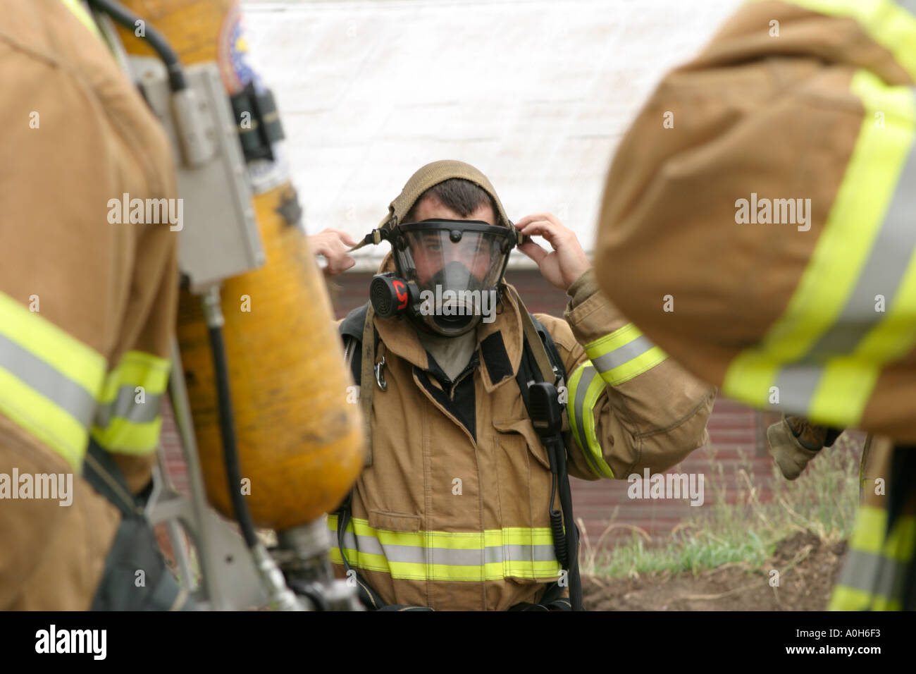 Firefighters Preparing to Enter Burning Structure Stock Photo - Alamy