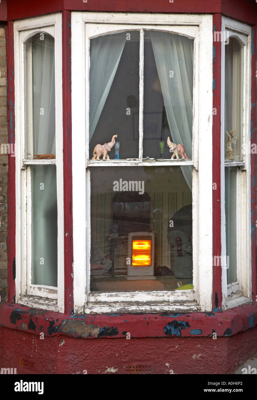 Bay window with two bar electric fire Stock Photo - Alamy