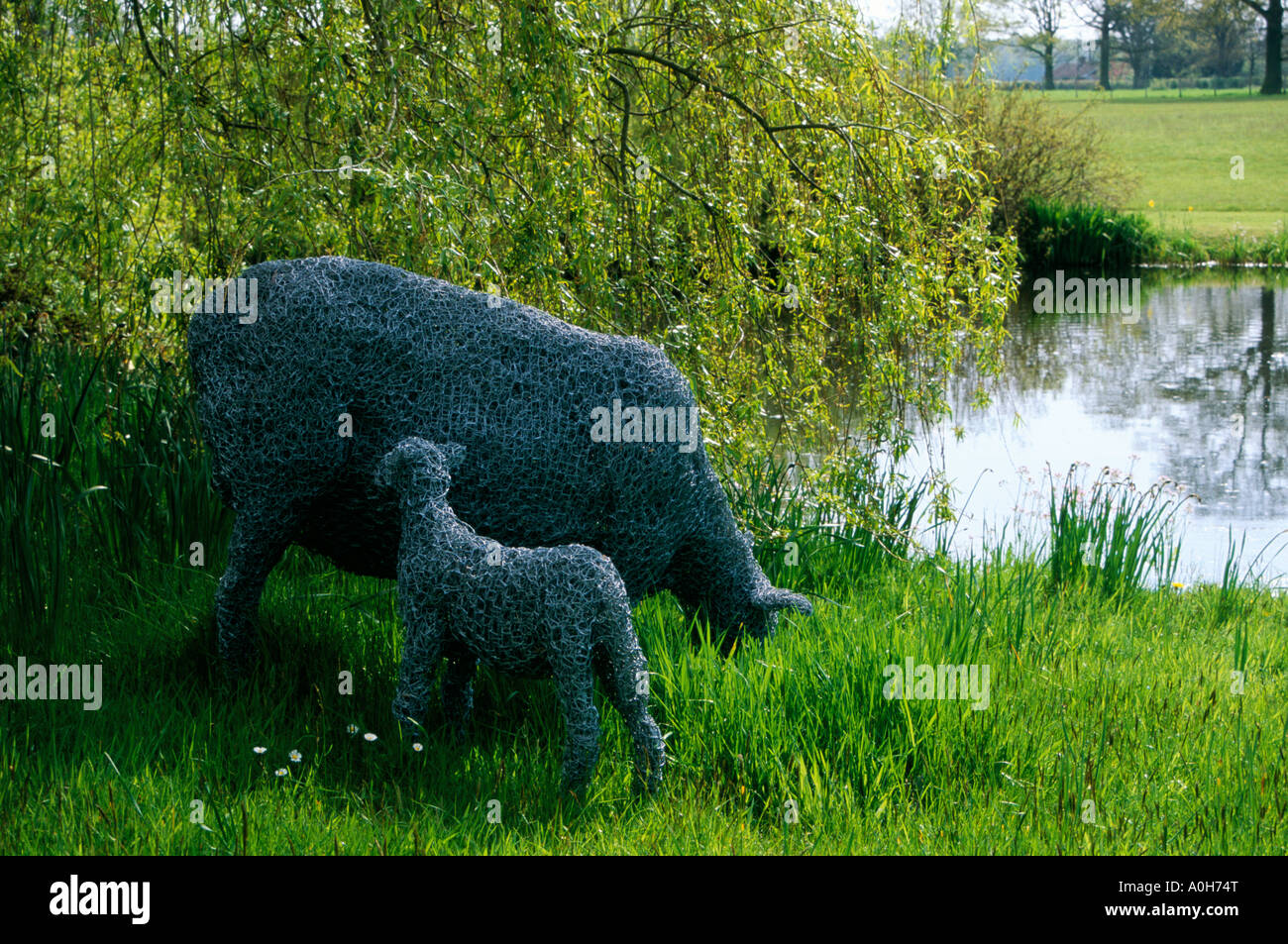 Private Garden Kent Wire sheep sculptures by Rupert Till beside weeping ...