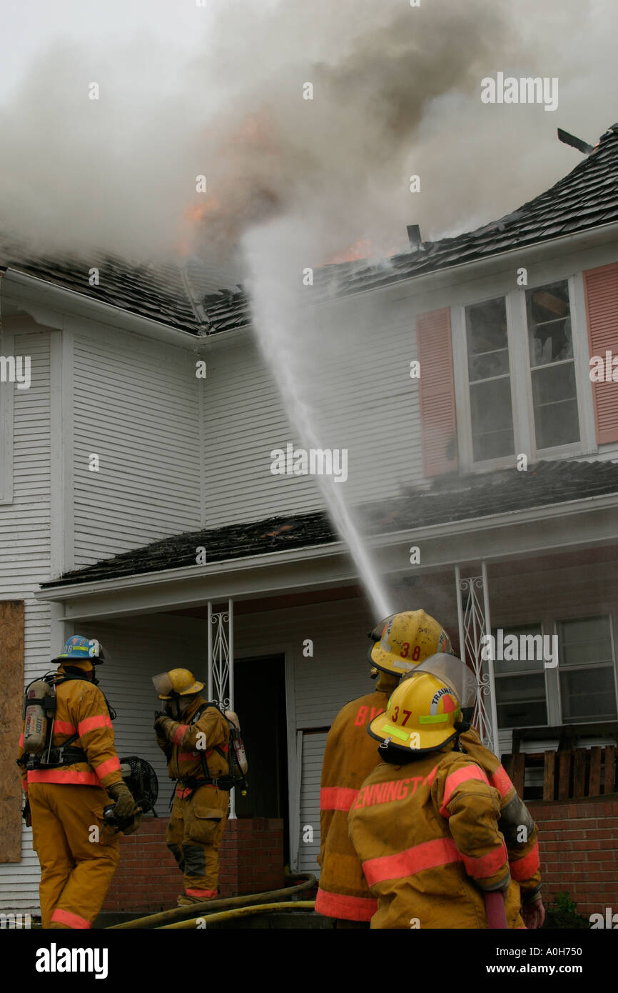Firefighters making Exterior Attack Stock Photo - Alamy