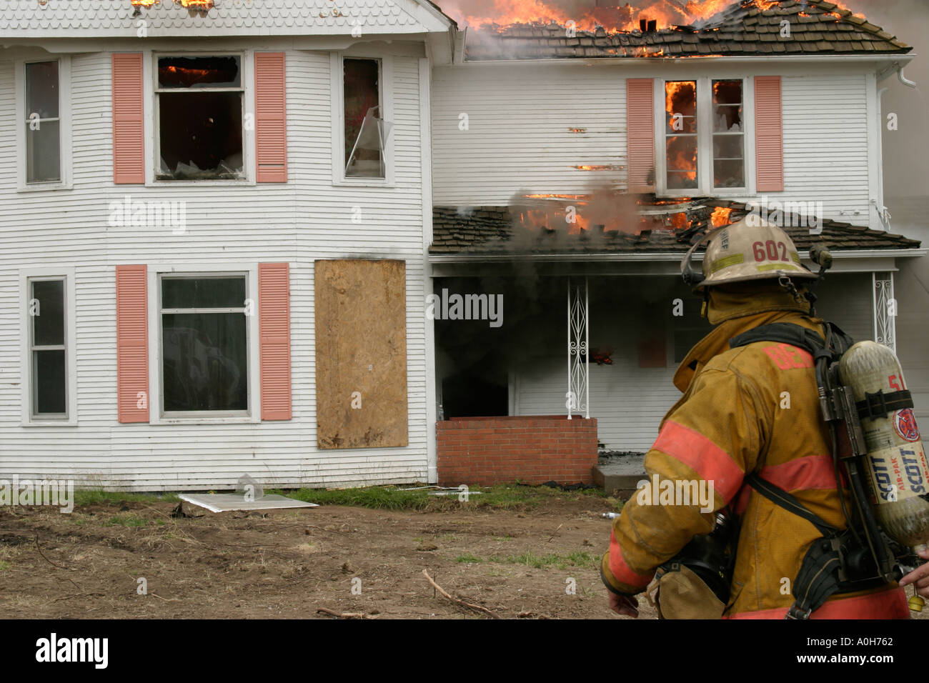 Firefighters making Exterior Attack Stock Photo - Alamy