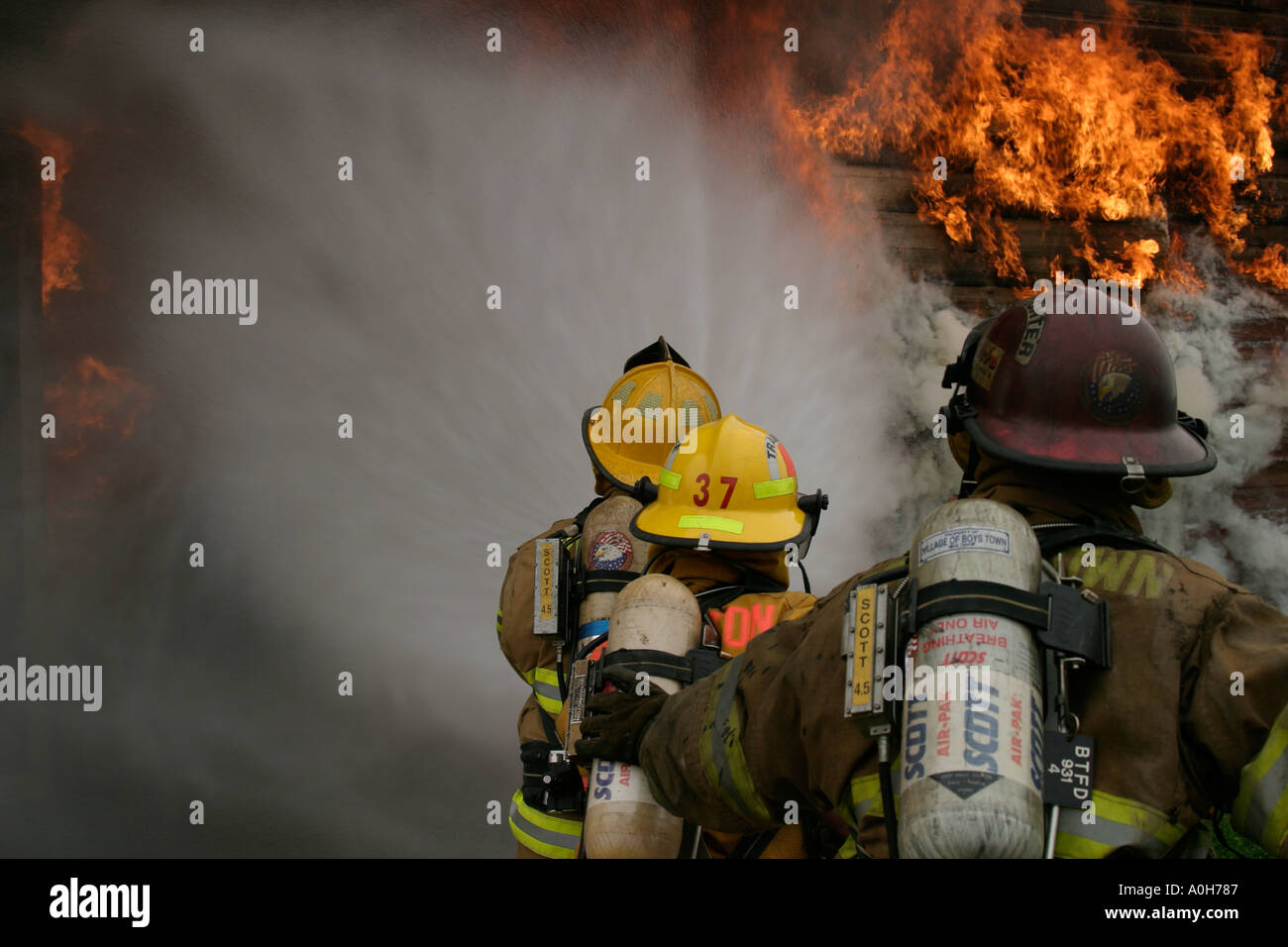 Firefighters Attacking Structure Fire Stock Photo - Alamy