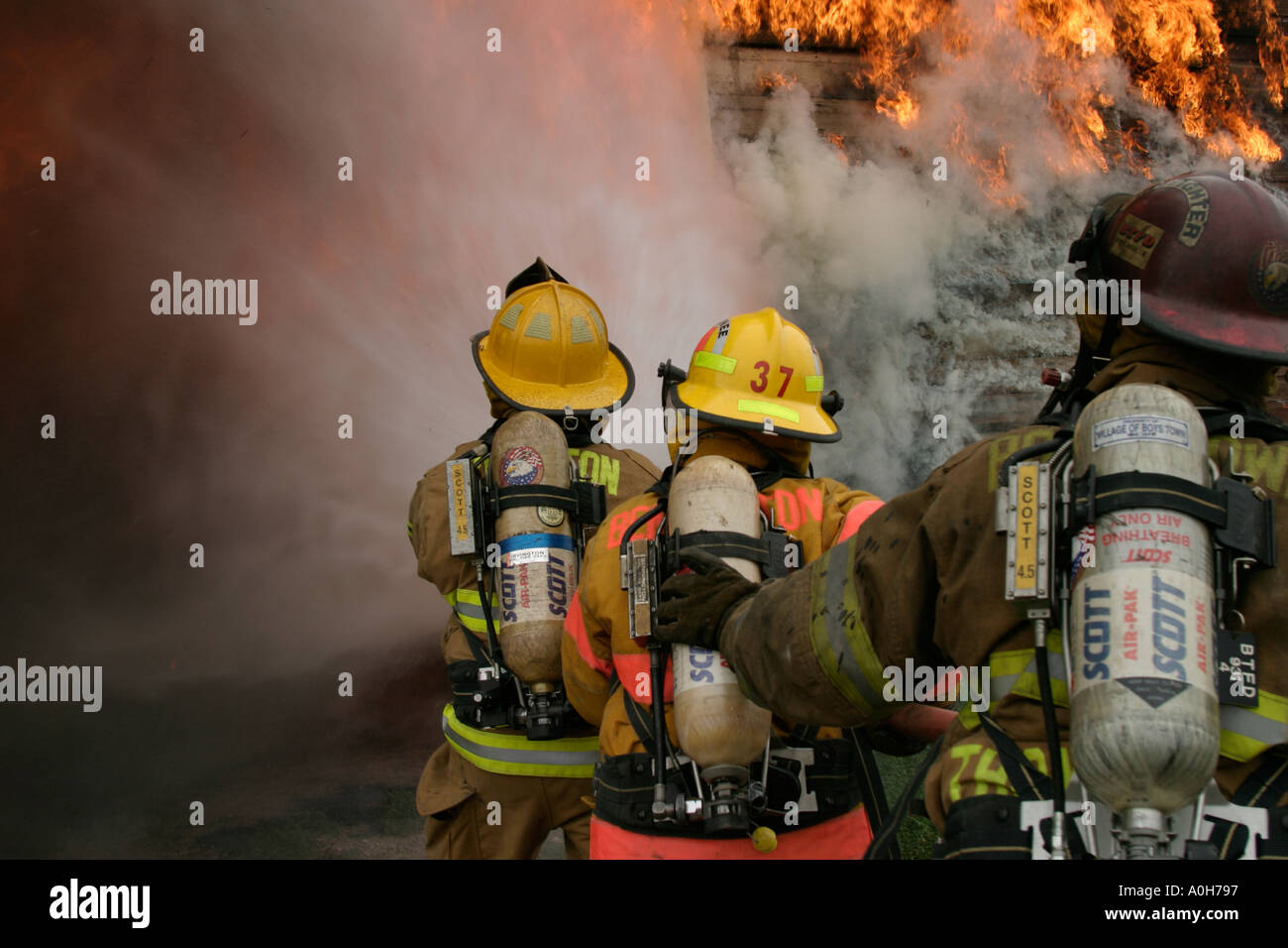 Firefighters Attacking Structure Fire Stock Photo - Alamy