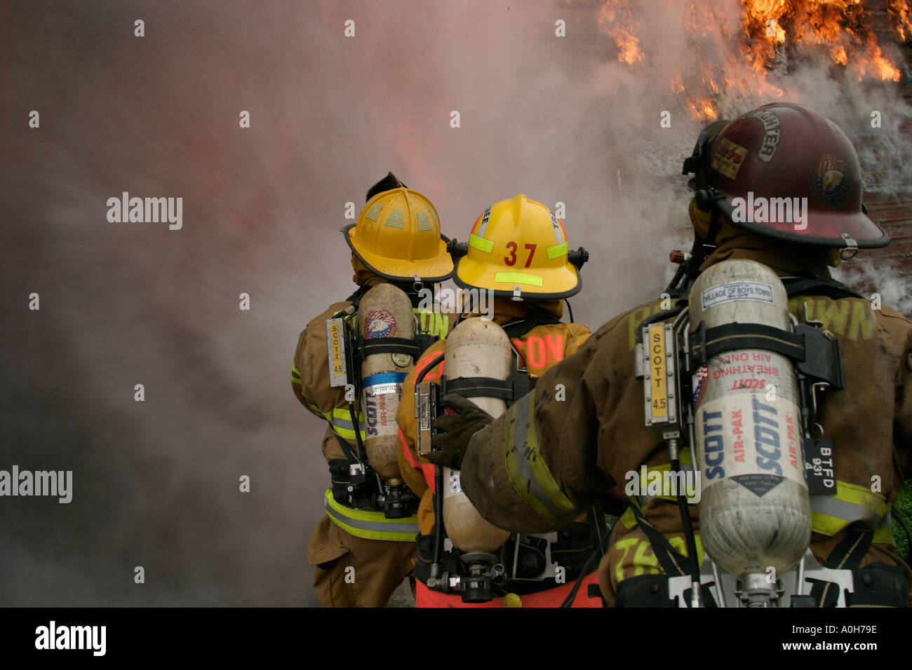 Firefighters Attacking Structure Fire Stock Photo - Alamy