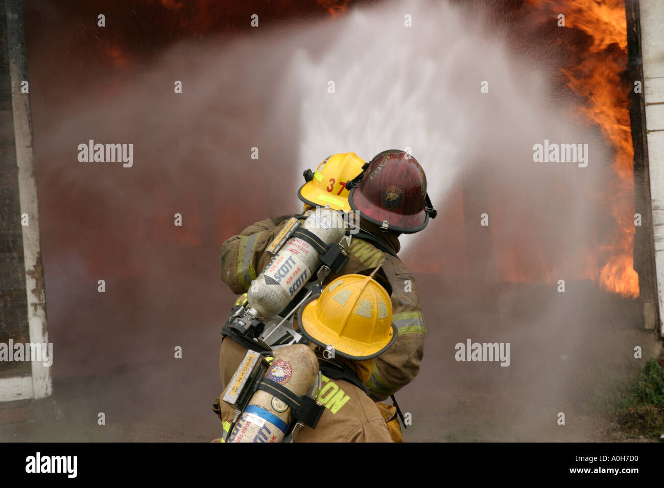 Firefighters Attacking Structure Fire Stock Photo - Alamy