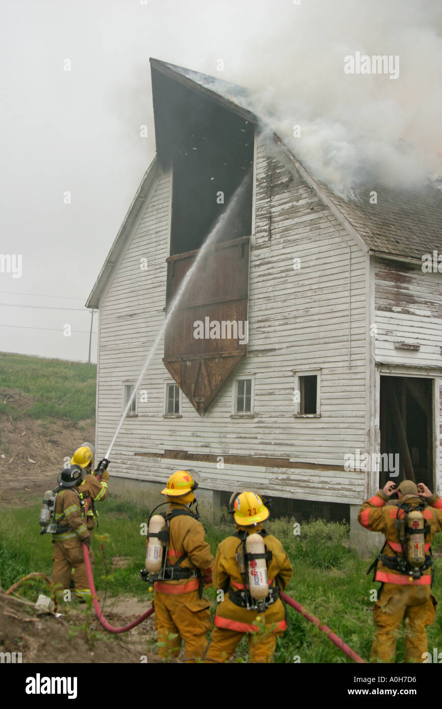 Firefighters fighting Barn Fire Stock Photo - Alamy