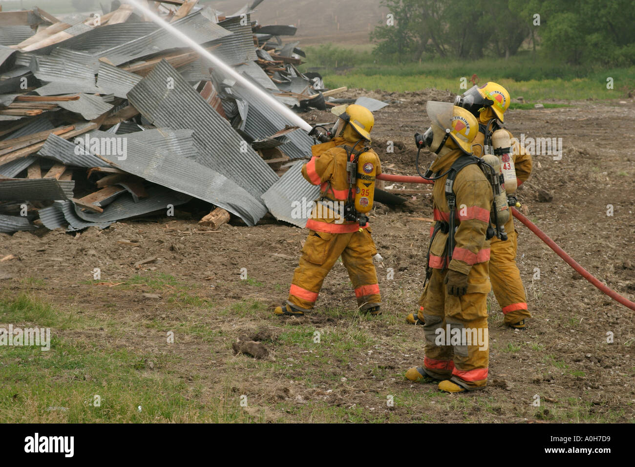 Firefighters fighting Barn Fire Stock Photo - Alamy