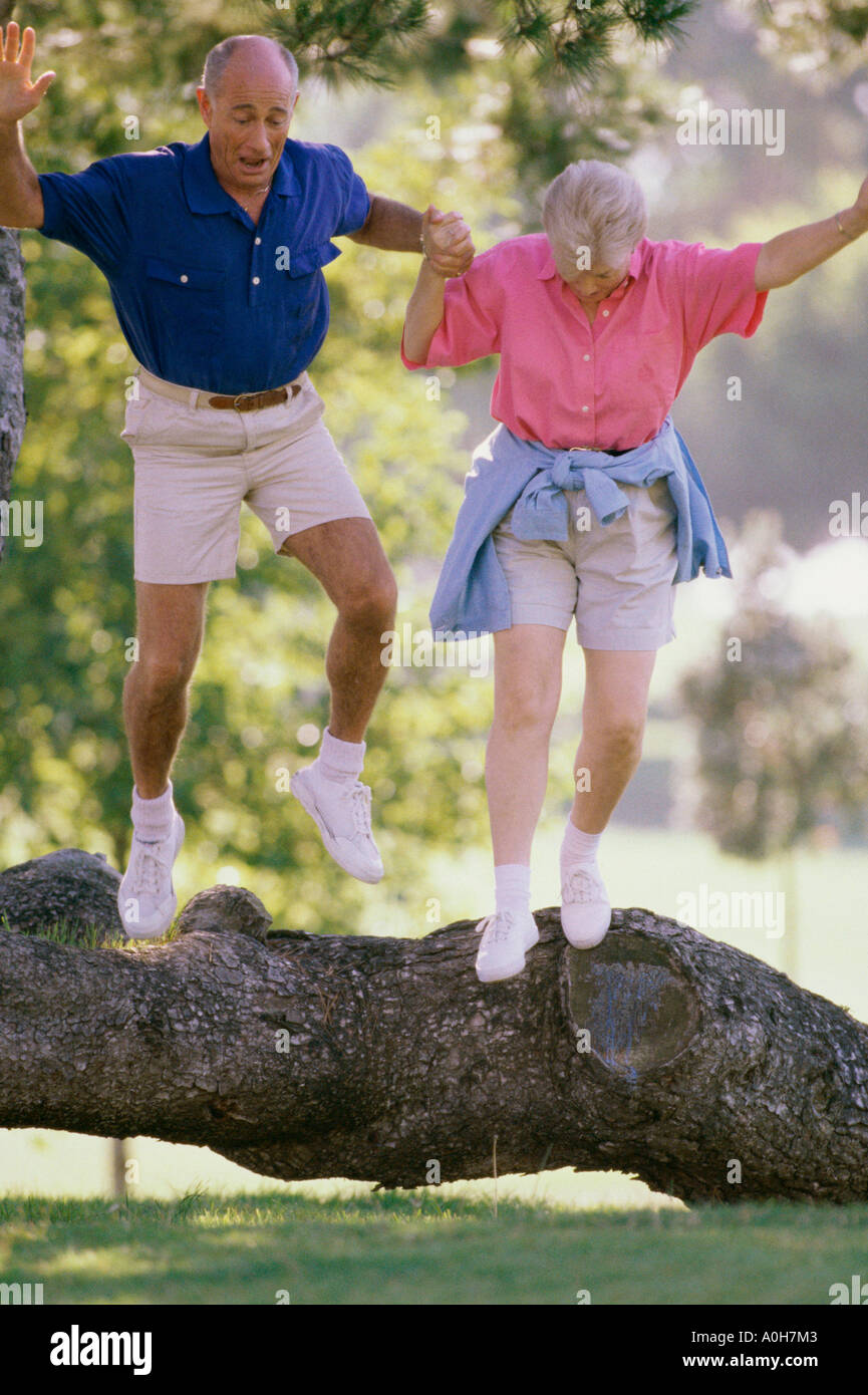 Woman jumping over log hi-res stock photography and images - Alamy