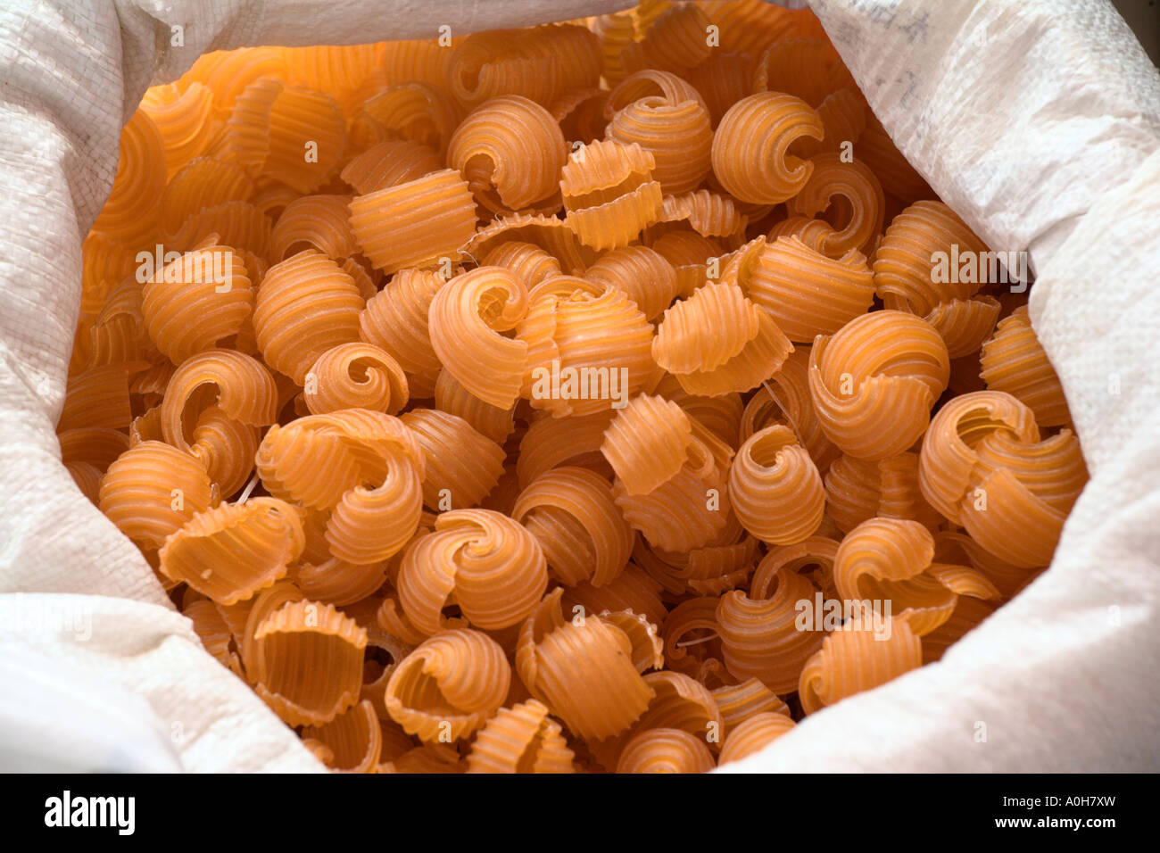 Shell macaroni for sale at outdoor market, Dali, Yunnan, China Stock ...