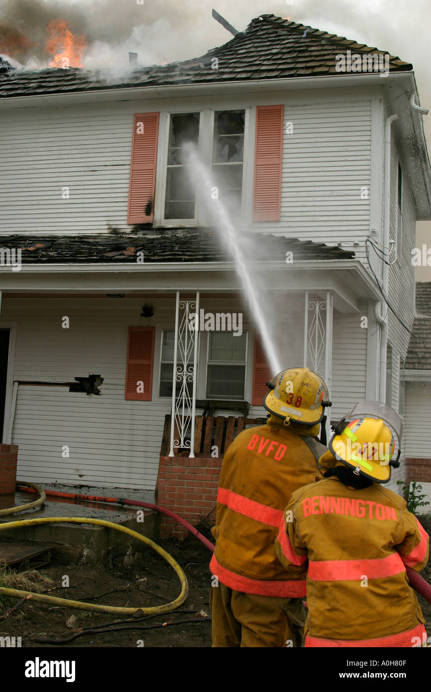 Firefighters making Exterior Attack Stock Photo - Alamy