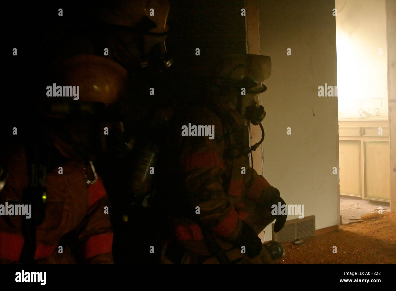 Firefighters inside Burning House Stock Photo - Alamy