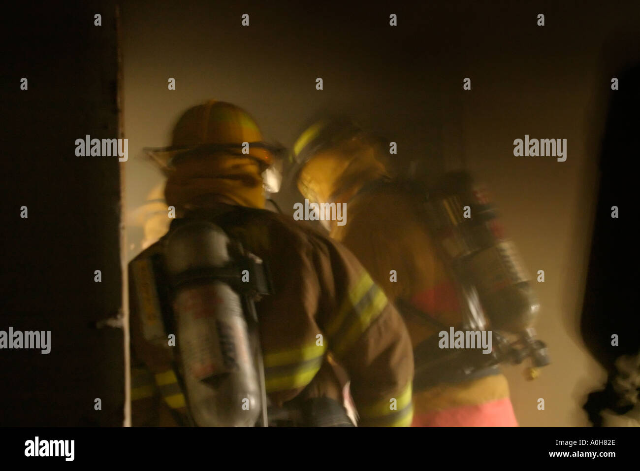 Firefighters inside Burning House Stock Photo - Alamy