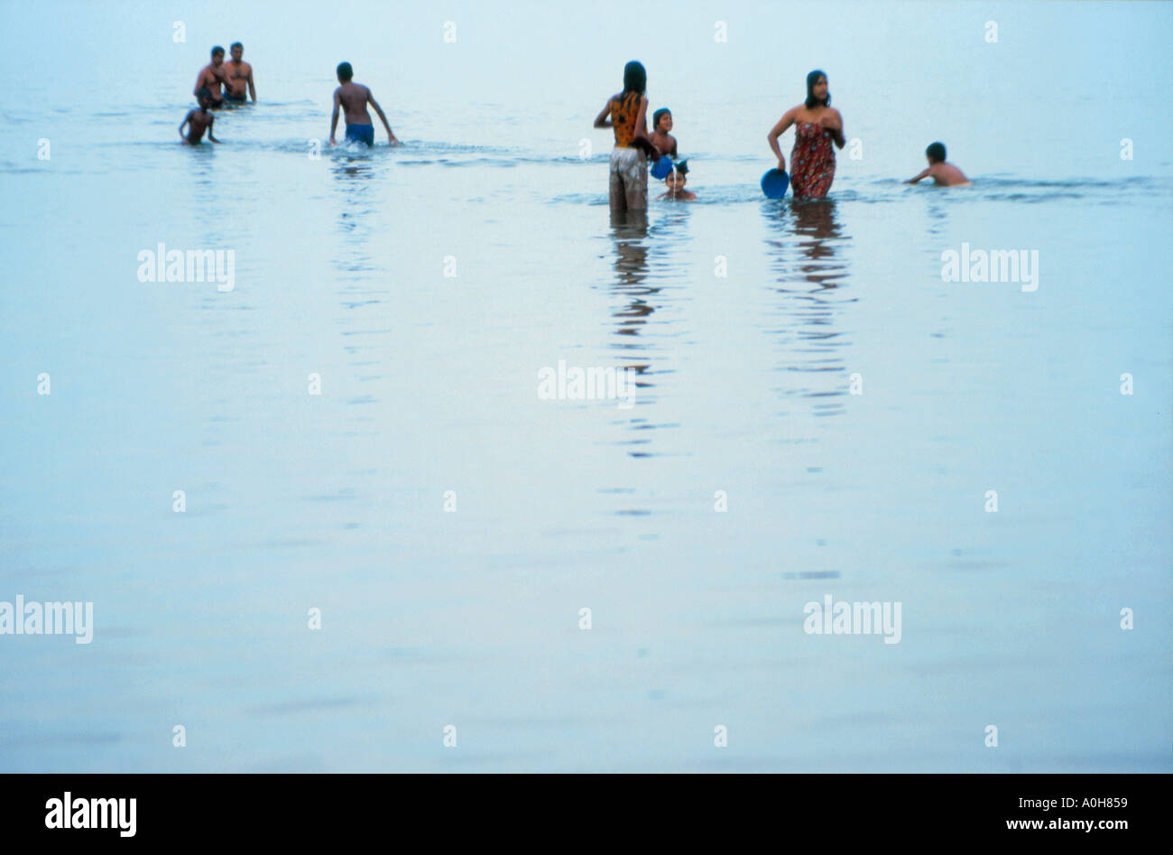 Bathers in lake Polonnaruwa Sri Lanka Stock Photo - Alamy