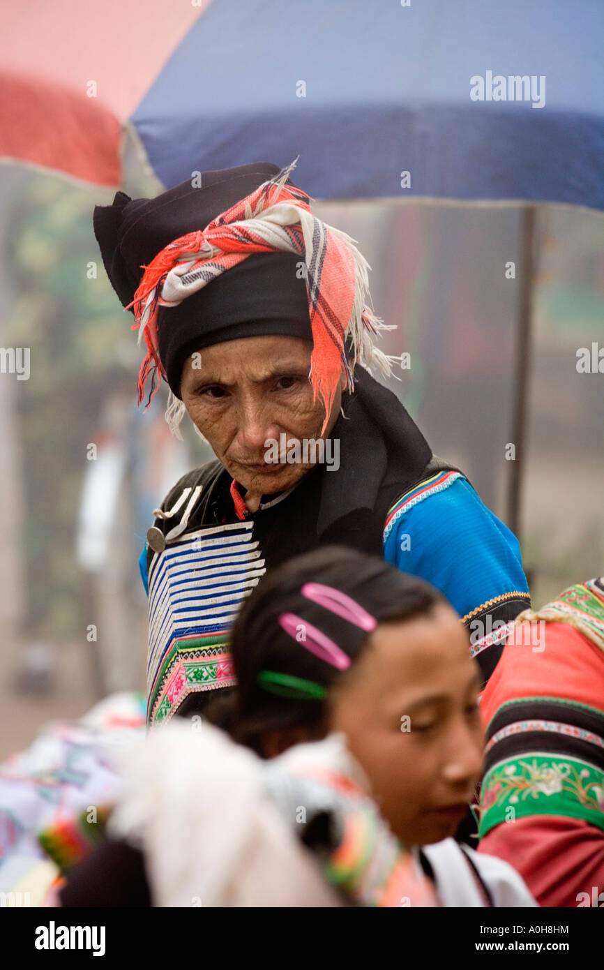 Mature ethnic woman supervises the activities of a teen girl, Shengcun ...