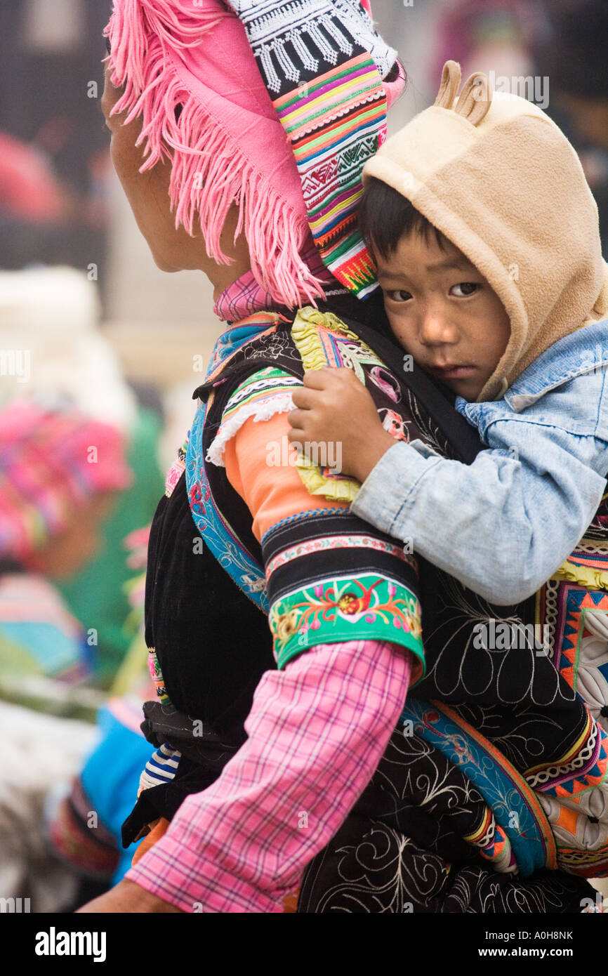 Child clinging to his mother hi-res stock photography and images - Alamy