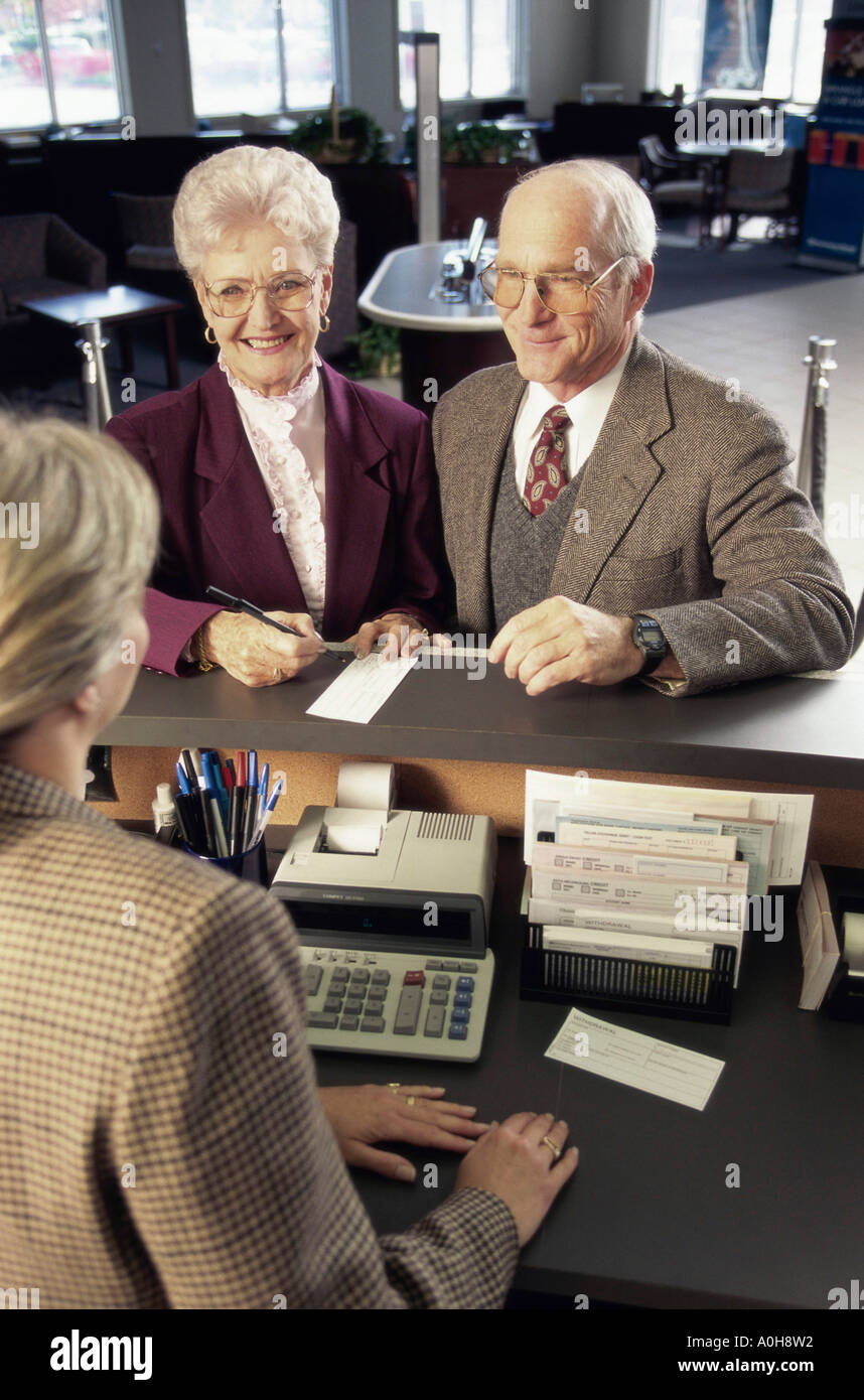 Senior bank counter hi-res stock photography and images - Alamy