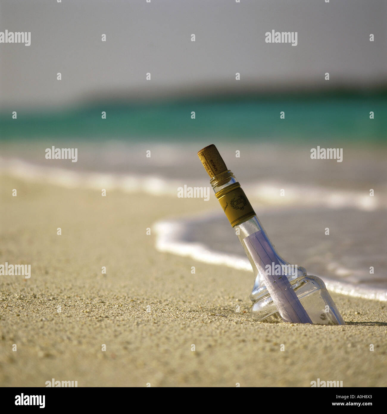 Paper in the sand hi-res stock photography and images - Alamy
