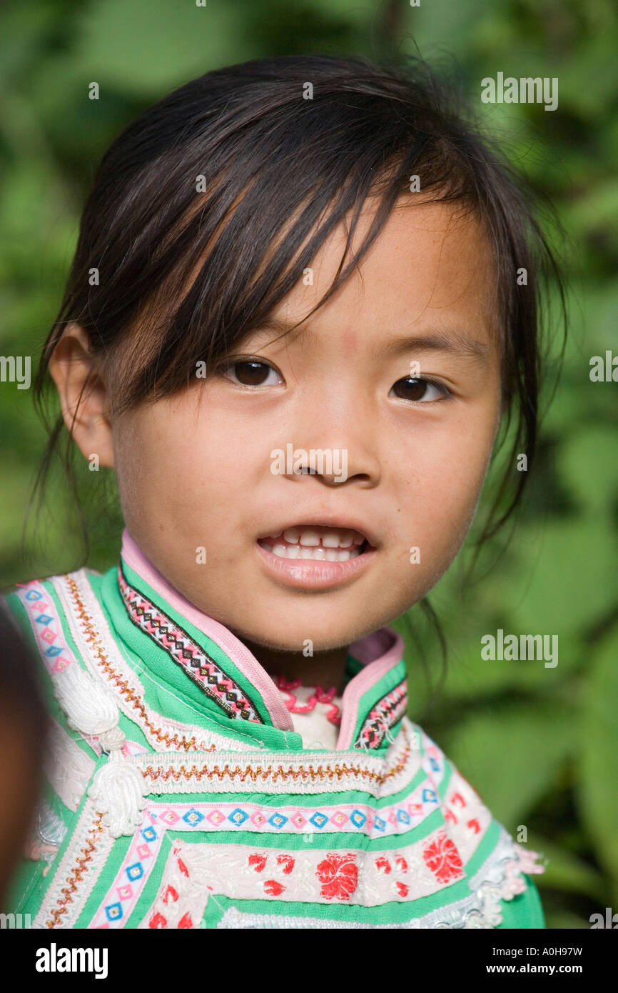Pretty Chinese minority girl in ethnic costume, Jin Zhu Zhai village ...
