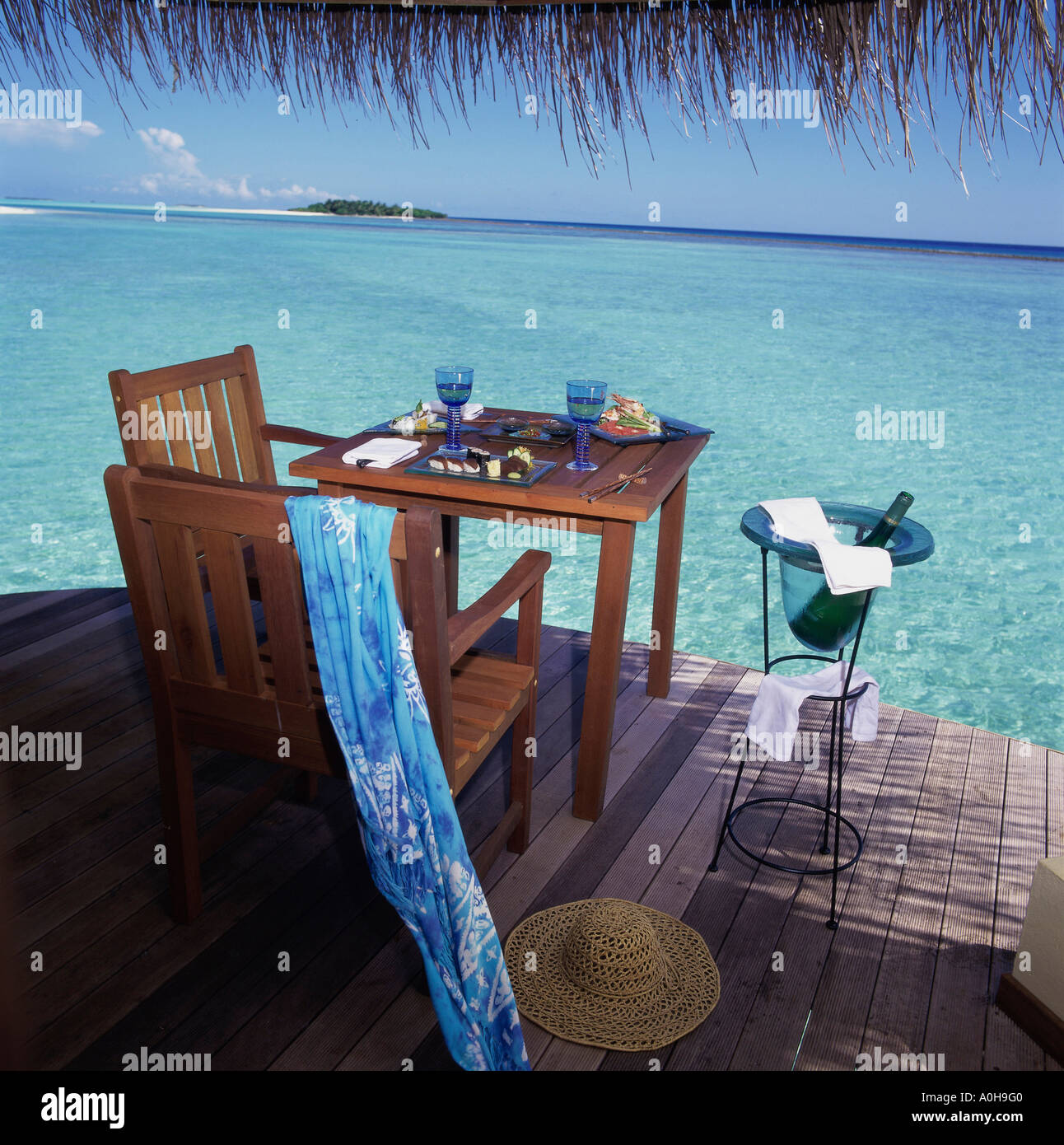 Food served on a table at the beach Stock Photo - Alamy