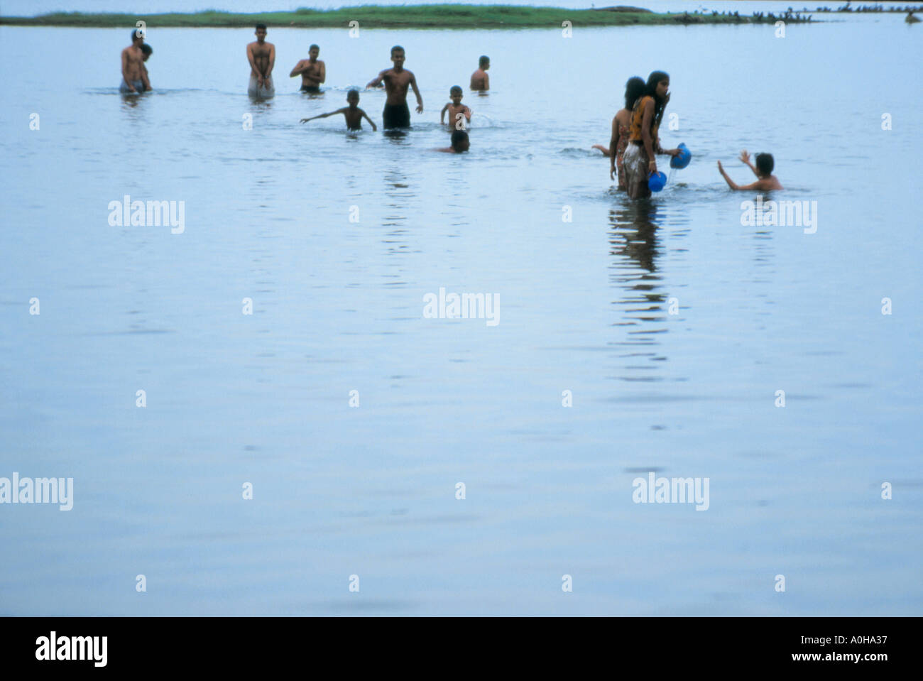 Bathers in lake Polonnaruwa Sri Lanka Stock Photo - Alamy