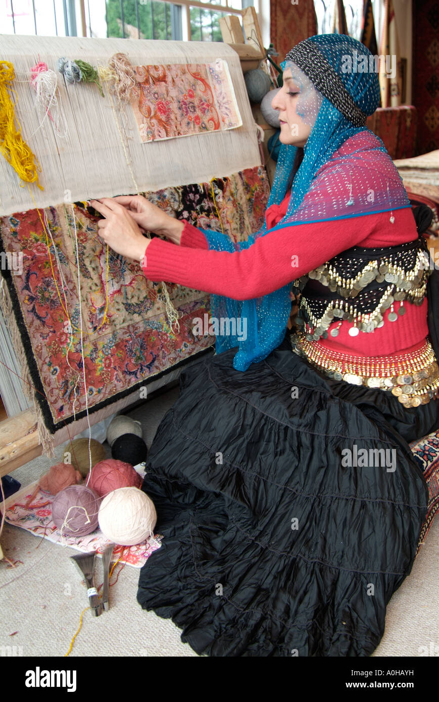 Woman Weaving Carpet On Loom High Resolution Stock Photography and ...