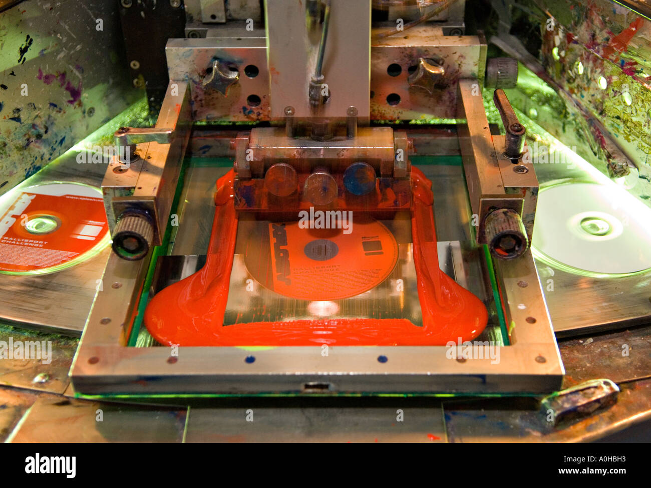 Silk screen label printing of CDs and DVDs Stock Photo - Alamy