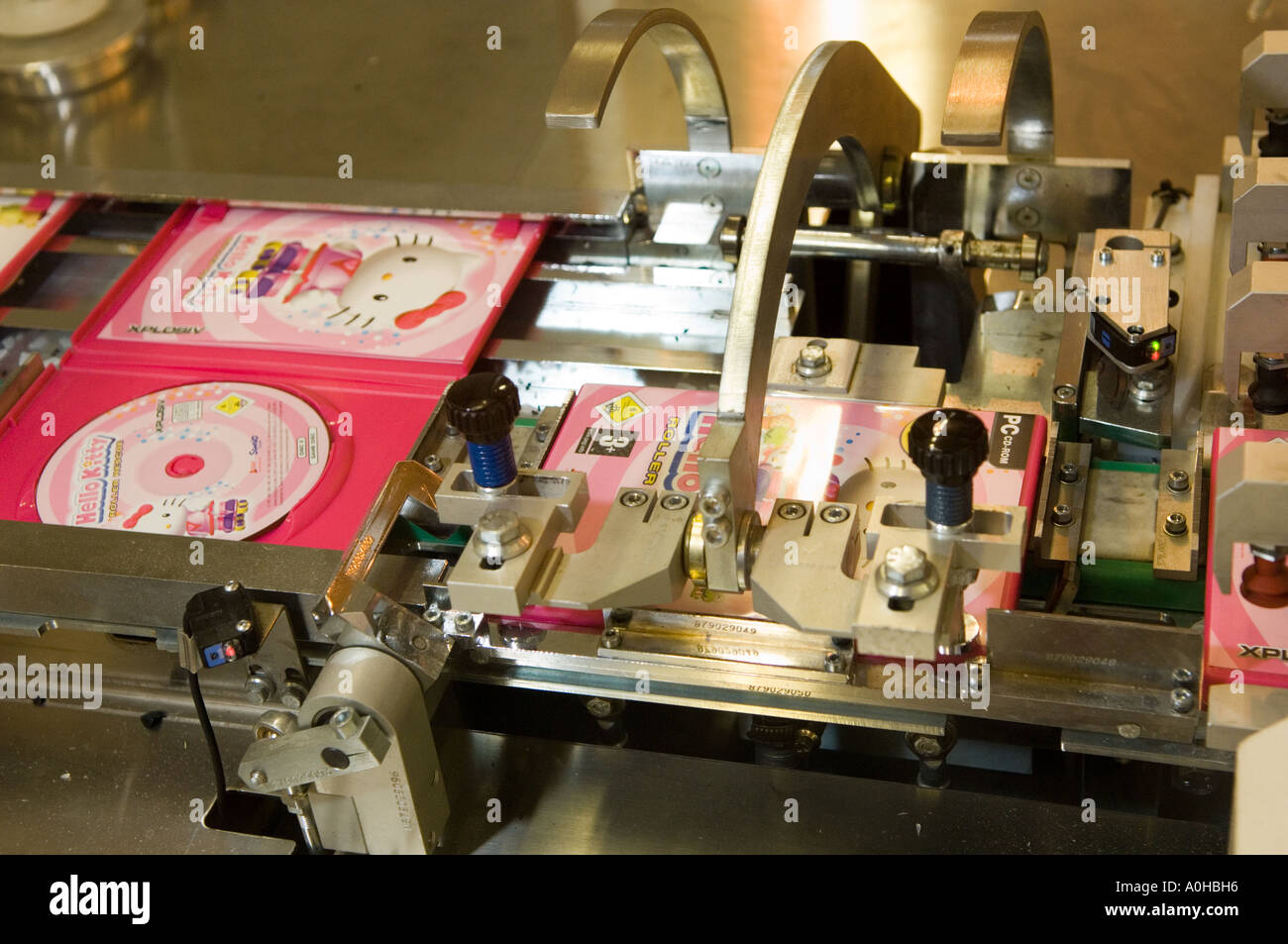 Automated DVD packaging system Stock Photo - Alamy