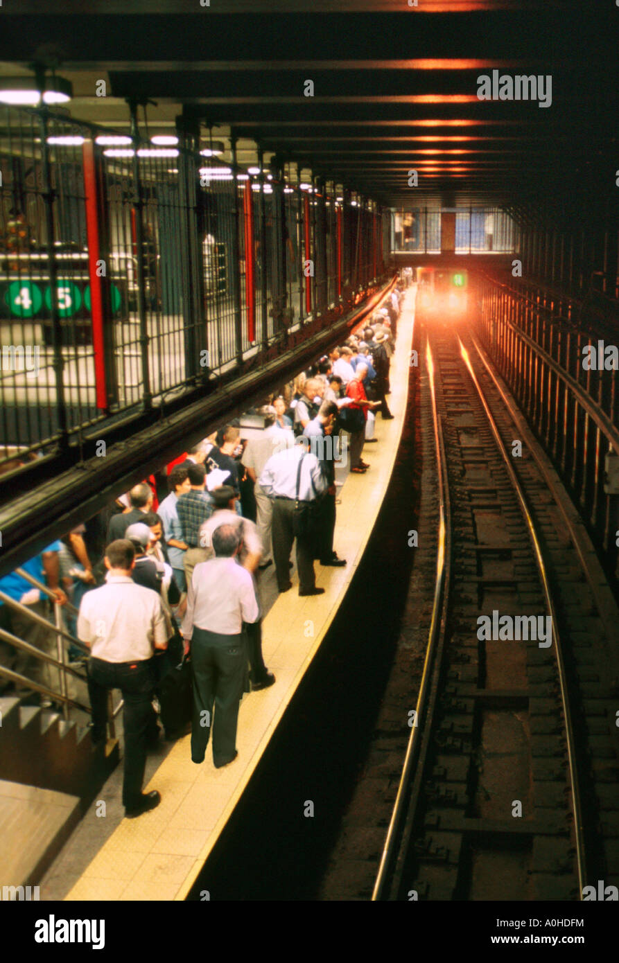 New York subway train station crowd. Commuter crowds waiting on the ...