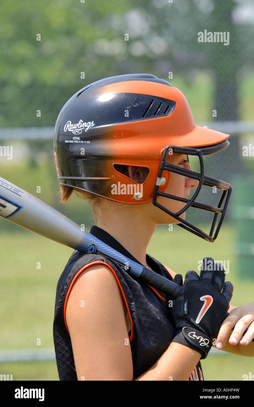 Close up of a teenage female Major League Softball player wearing a ...