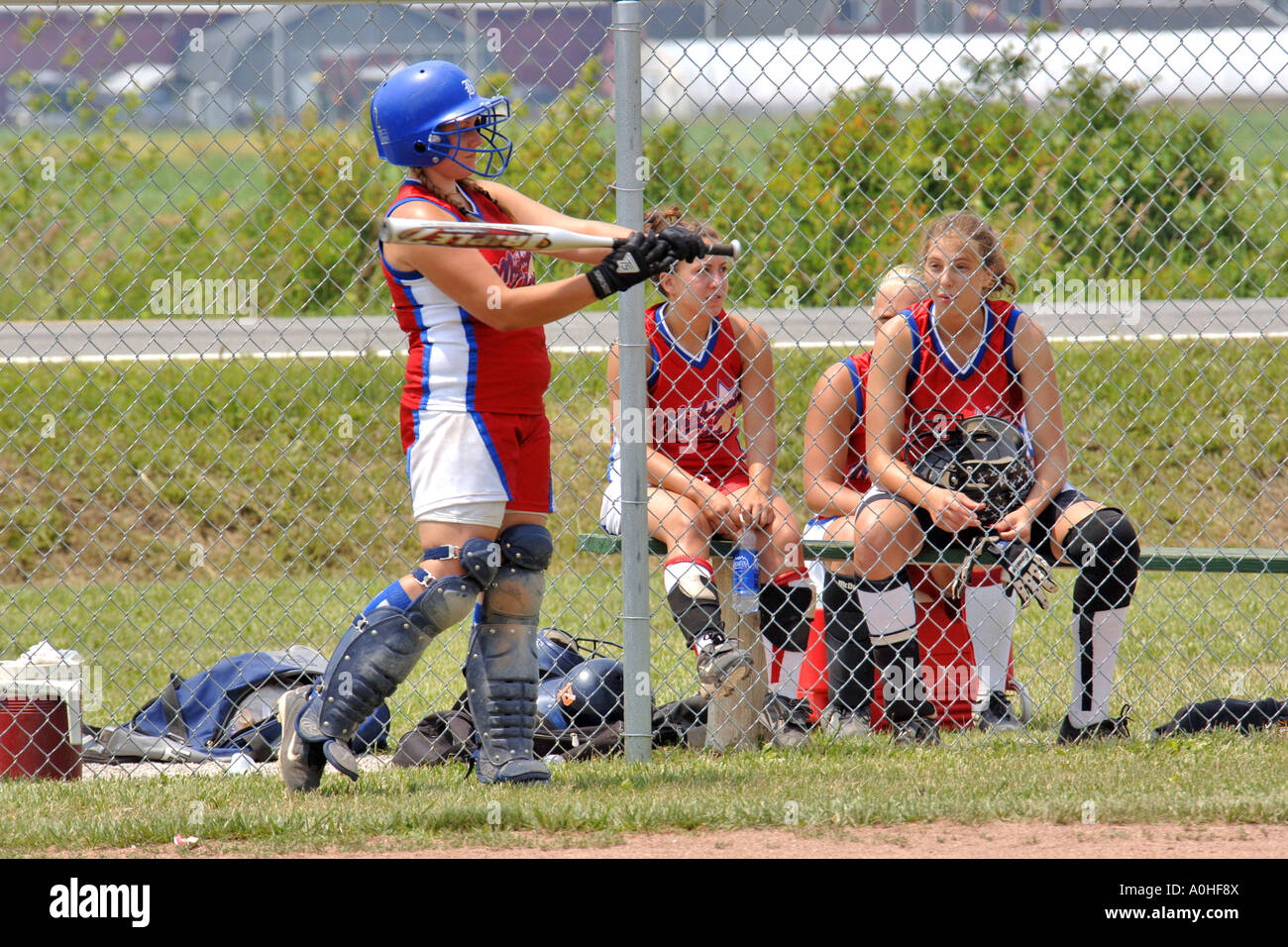 Teenage female Major league Softball game - geting ready to bat Stock ...