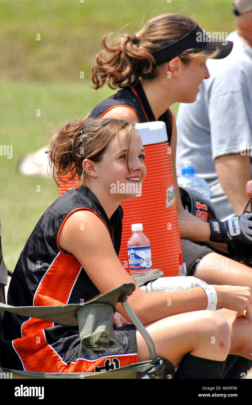 Teenage female Major league Softball game - sitting on the bench Stock ...