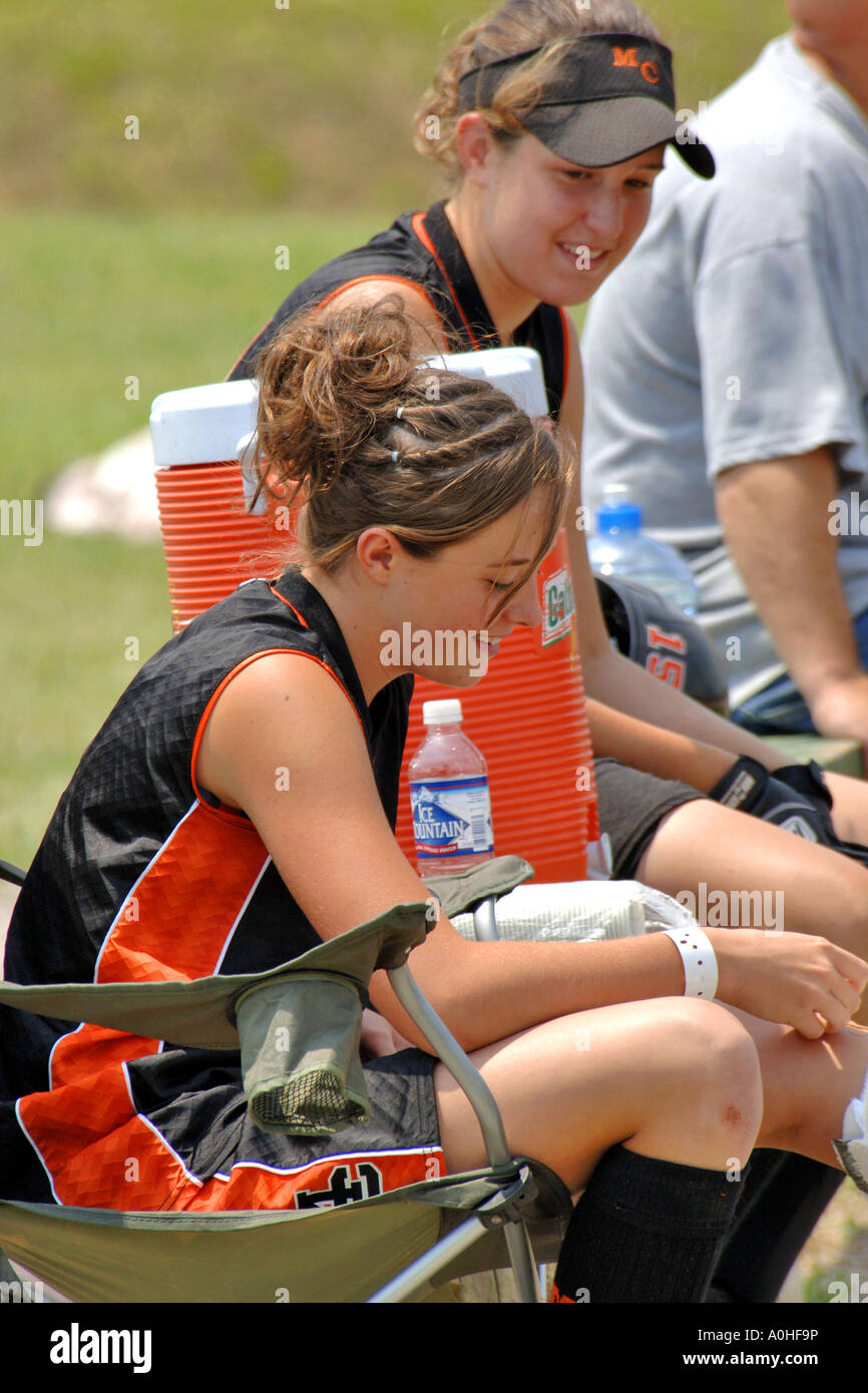 Teenage female Major league Softball game - sitting on the bench Stock ...