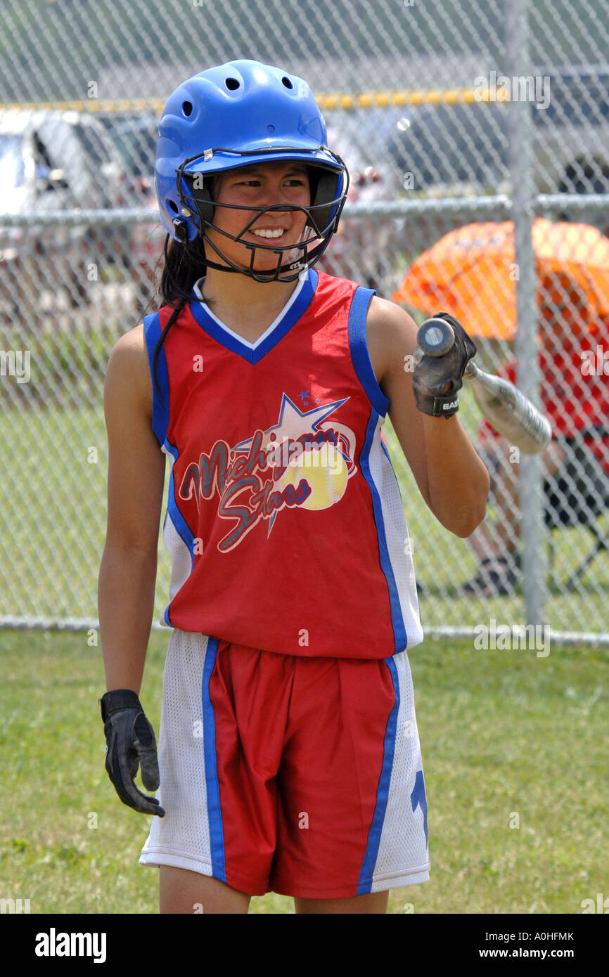 A teenage female Major League Softball player wearing a helmet Stock ...