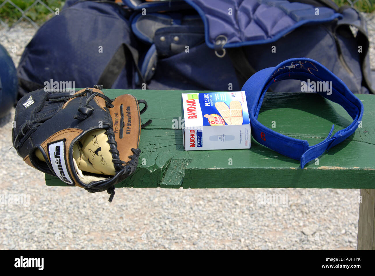 Softball kit including plasters, sunvisor, glove and ball Stock Photo ...