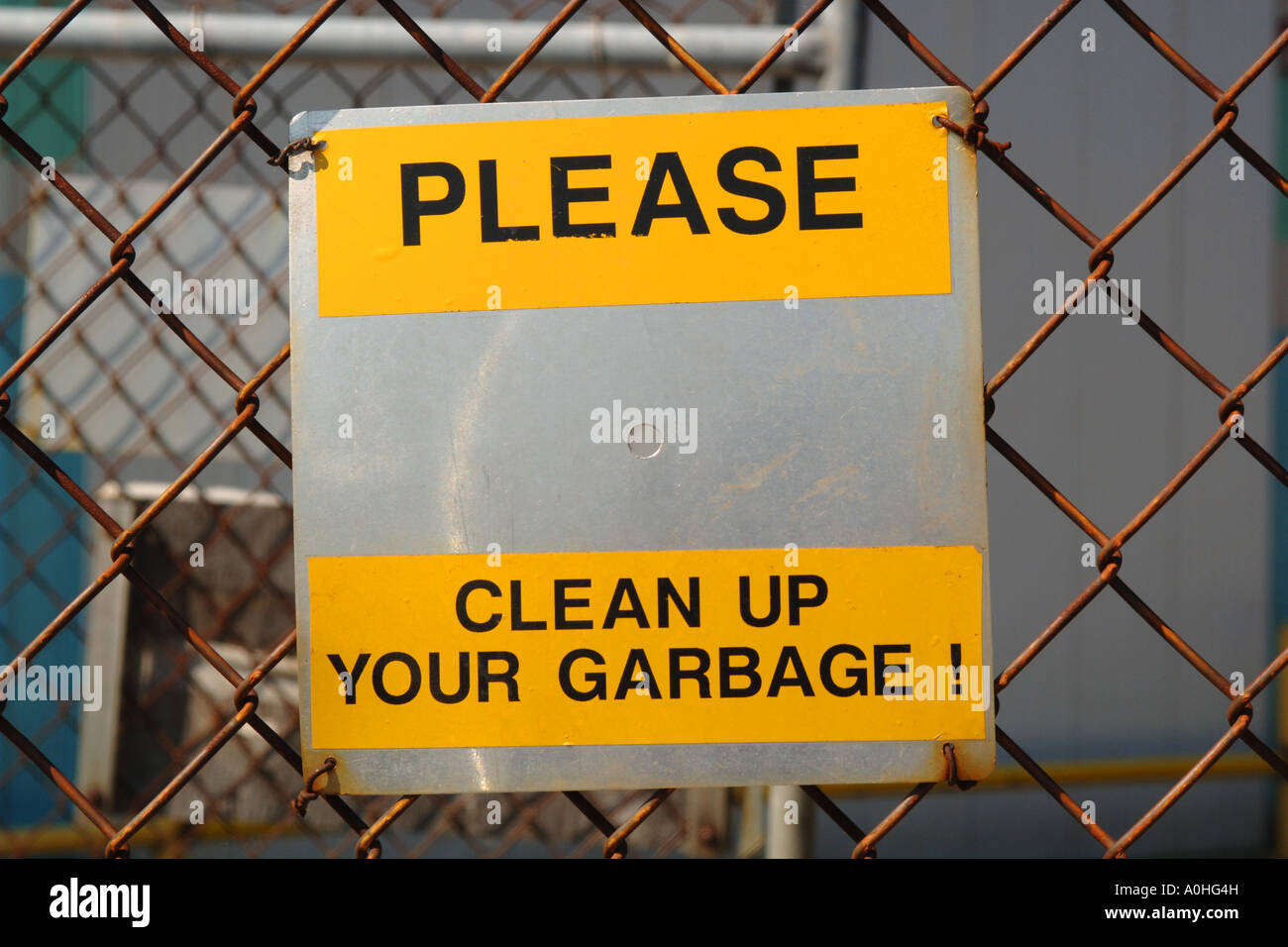 Polite sign clean up your garbage Stock Photo - Alamy