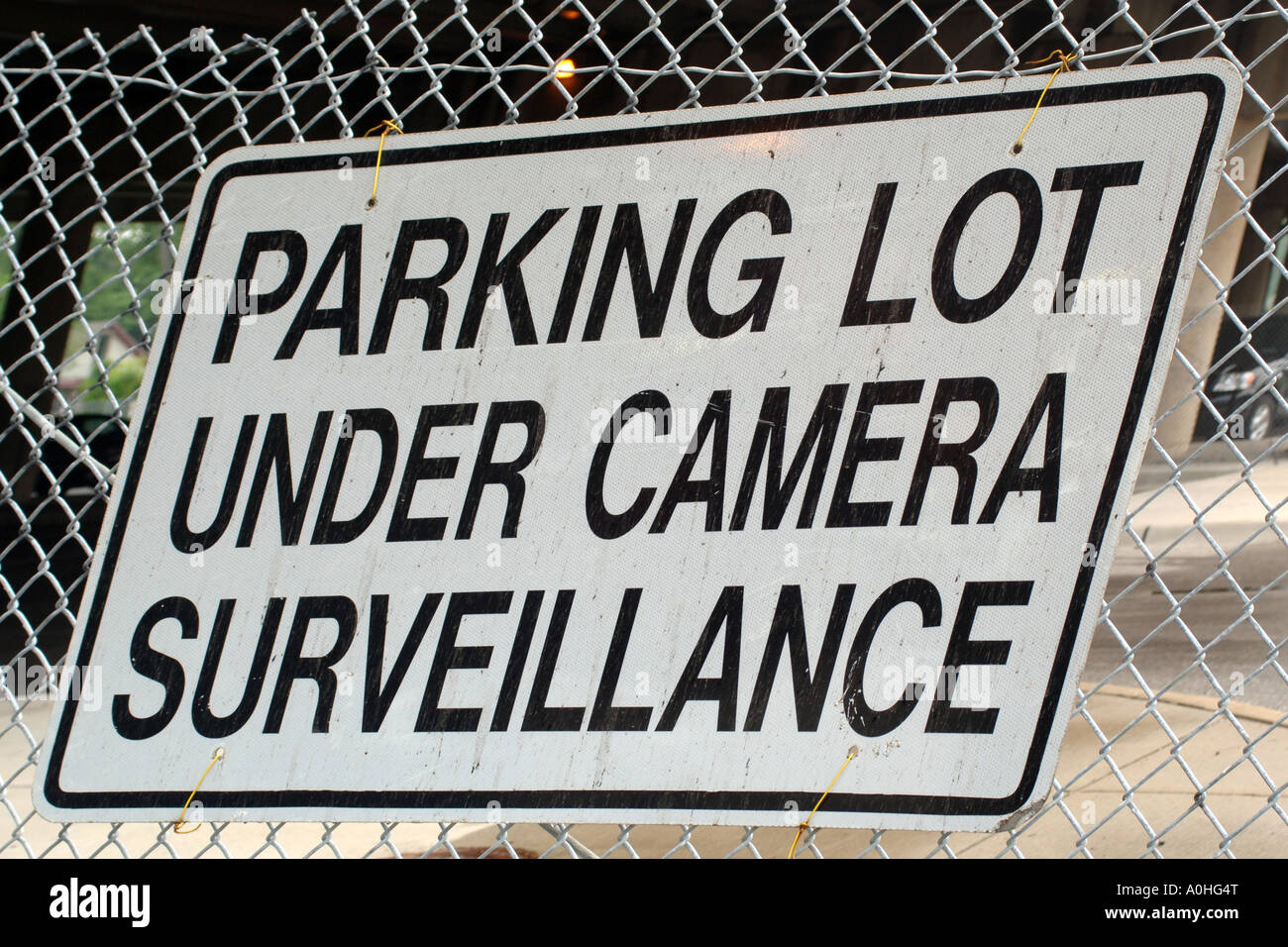 Parking Lot Under Camera Surveillance sign to deter car theives Stock ...