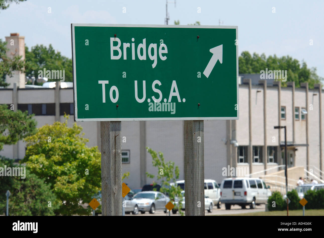 Direction sign "Bridge to U S A" seen in Canada Stock Photo - Alamy