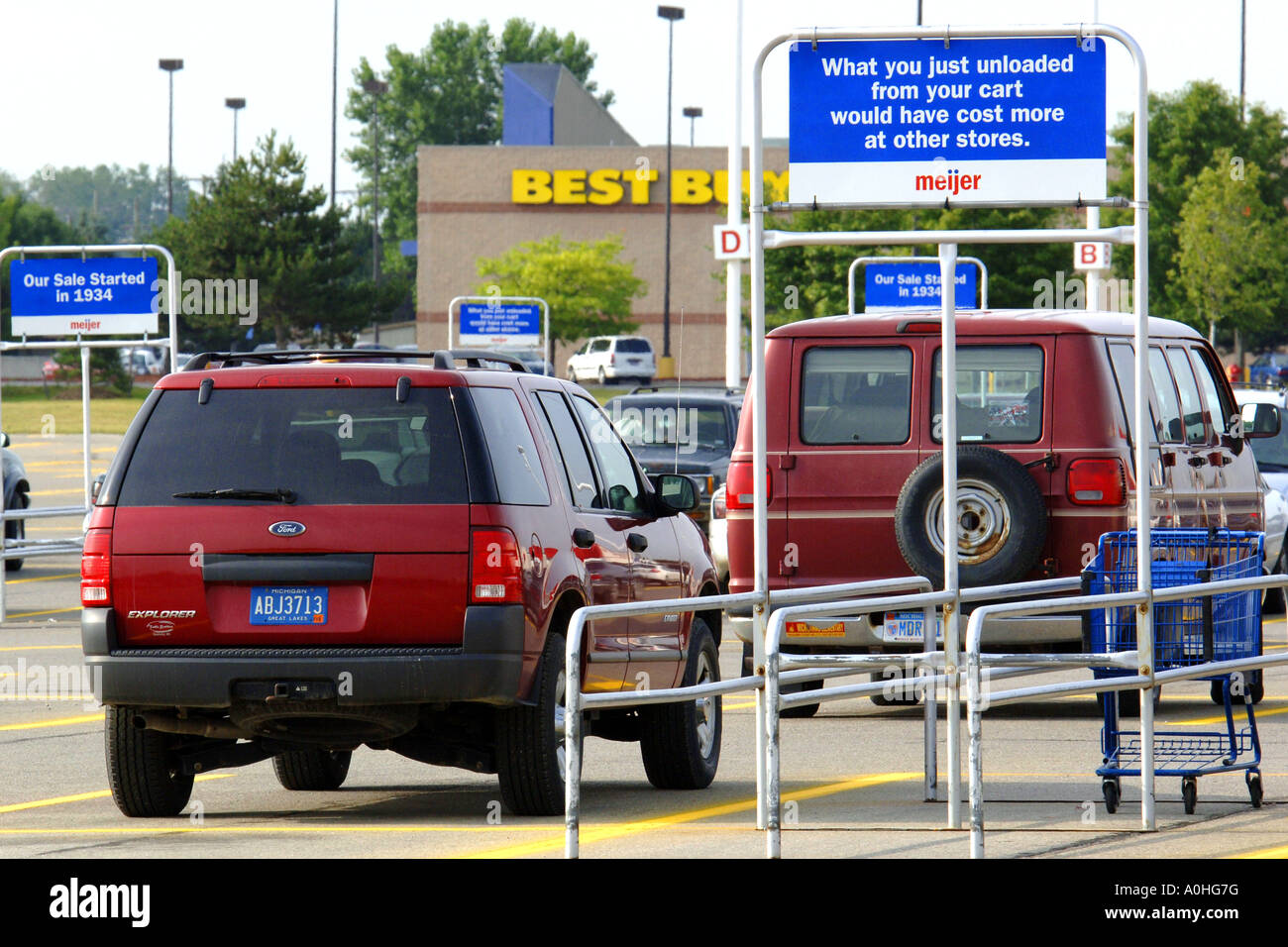 Advertising signs in a parking lot Stock Photo - Alamy
