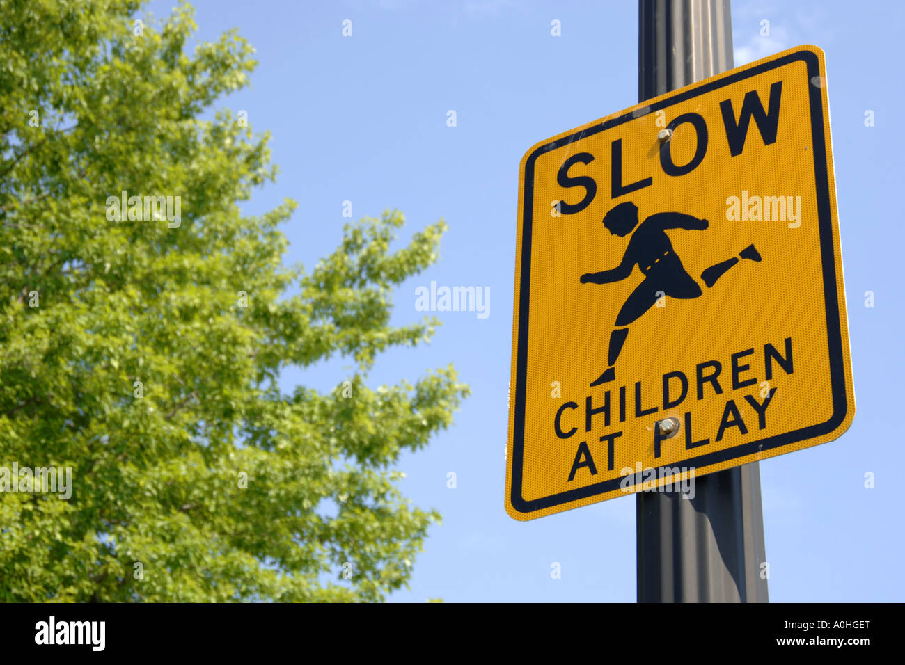Children playing road signs warning hi-res stock photography and images ...