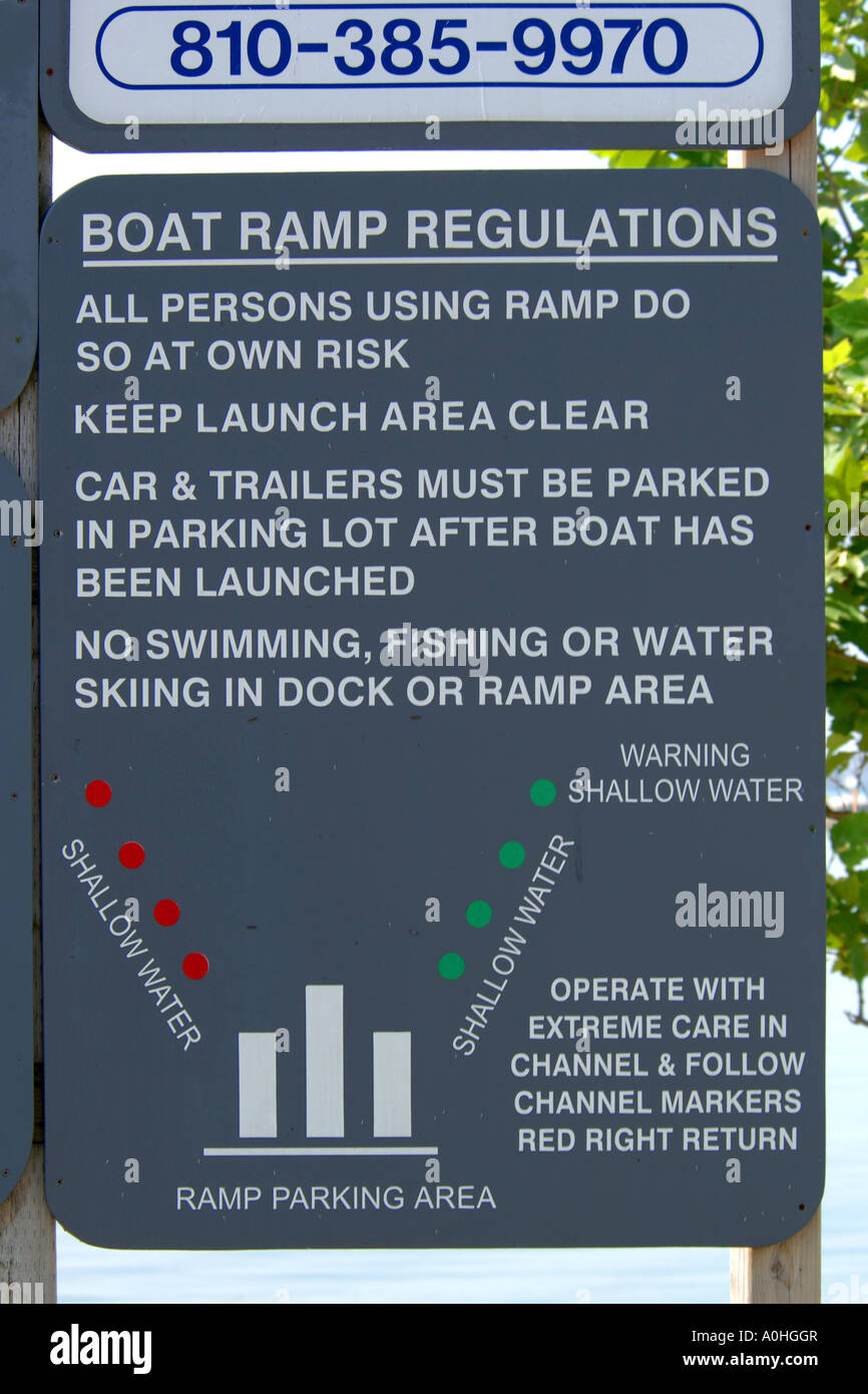 Boat ramp regulations sign Stock Photo - Alamy