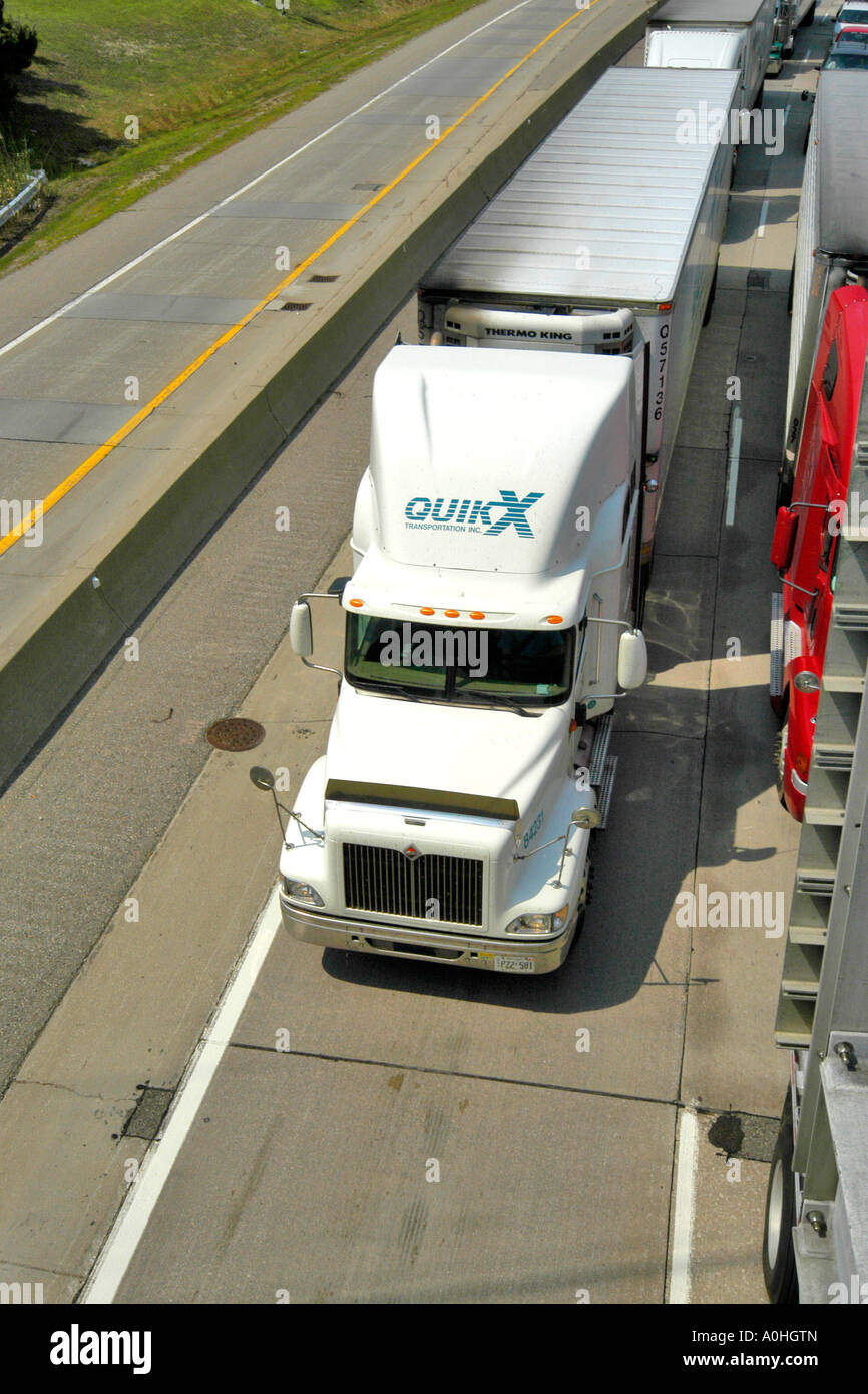 Tractor And Trailer With A Queue Of Traffic High Resolution Stock ...