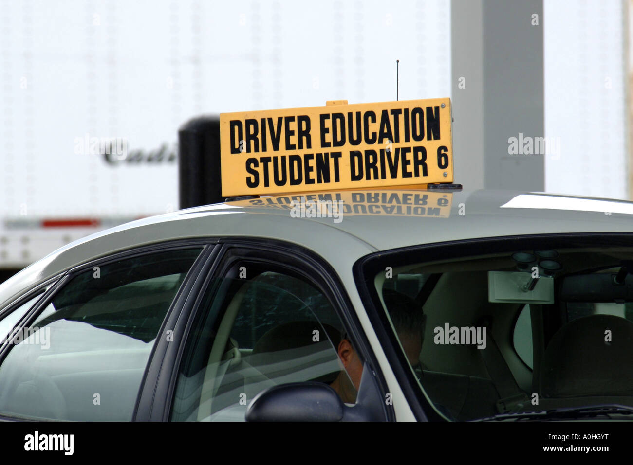 Driver Education vehicle - Learner driver vehicle with a placard on the ...