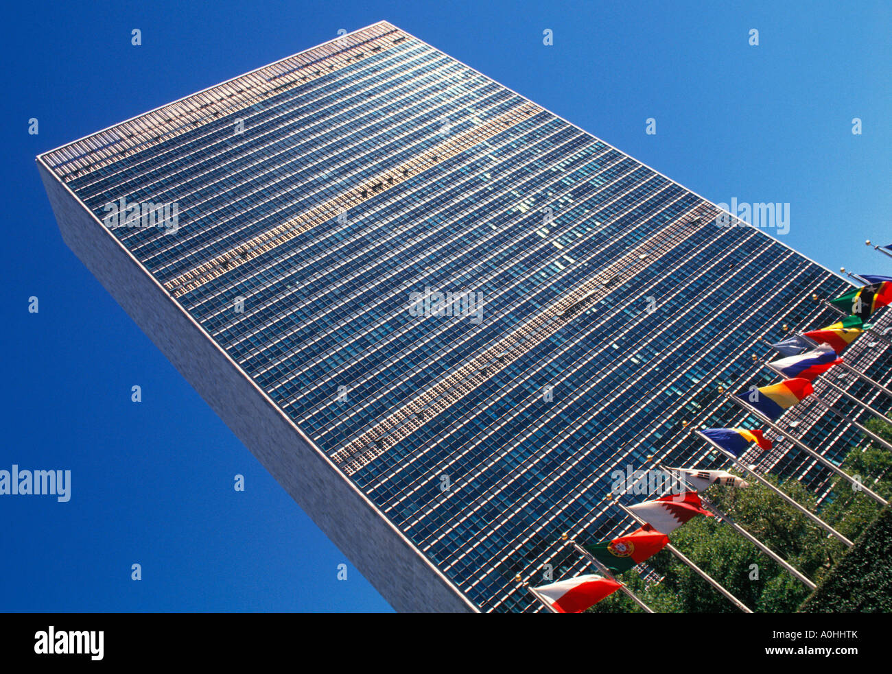 The United Nations Headquarters Secretariat Building and international flags. Exterior. Nobody ...