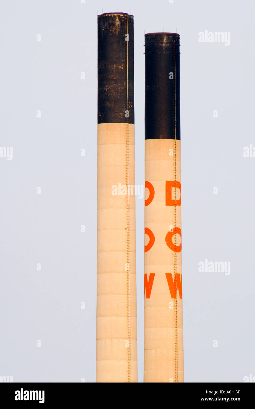 Two Tall Smoke stacks Stock Photo - Alamy