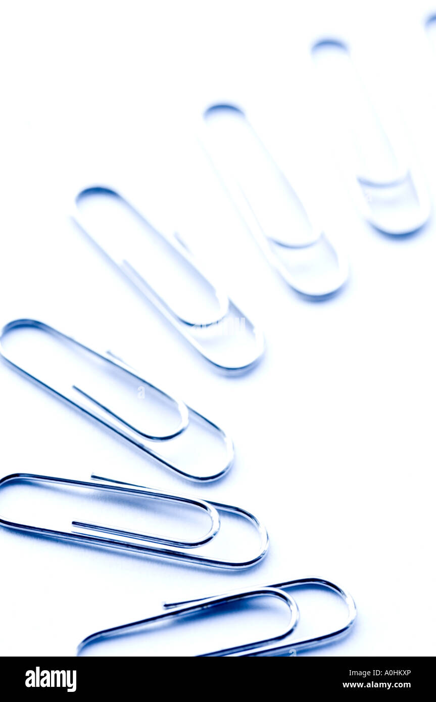 Paper Clips on white background Stock Photo - Alamy