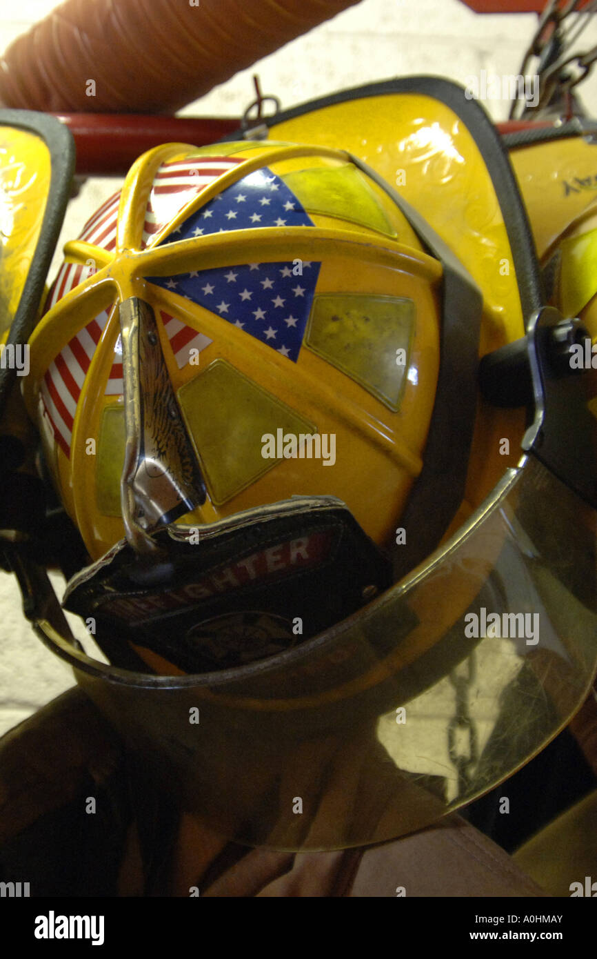 Yellow firefighters helmet Stock Photo - Alamy